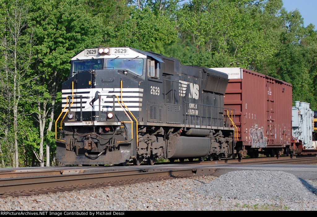 NS SD-70M #2629 leads an eastbound local across Walter Hwy.